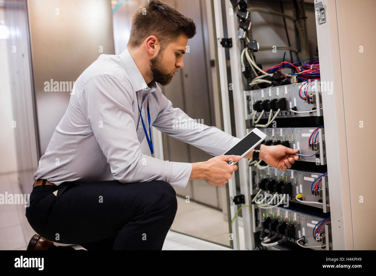 Analyzing with tablet hi-res stock photography and images - Alamy