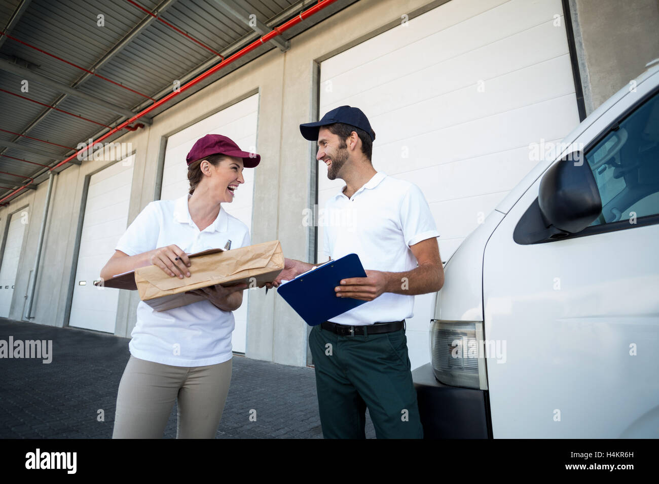Delivery man woman hi-res stock photography and images - Alamy