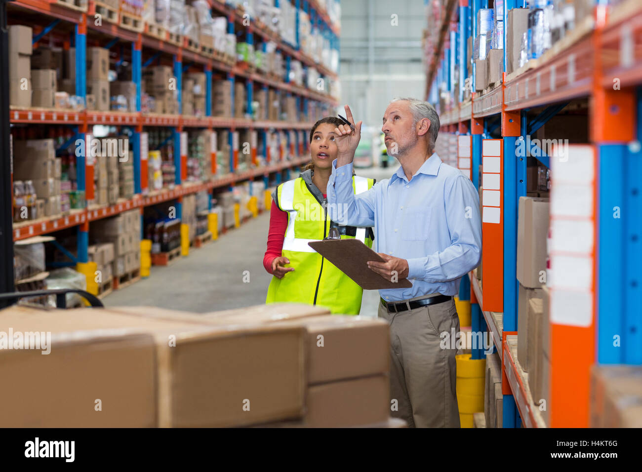 Warehouse manager checking stock hi-res stock photography and images ...