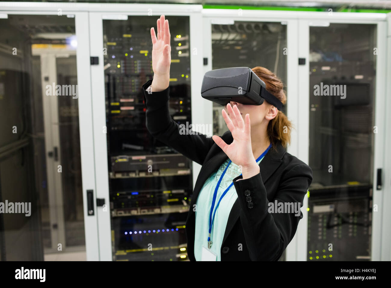 Technician using virtual reality headset Stock Photo - Alamy