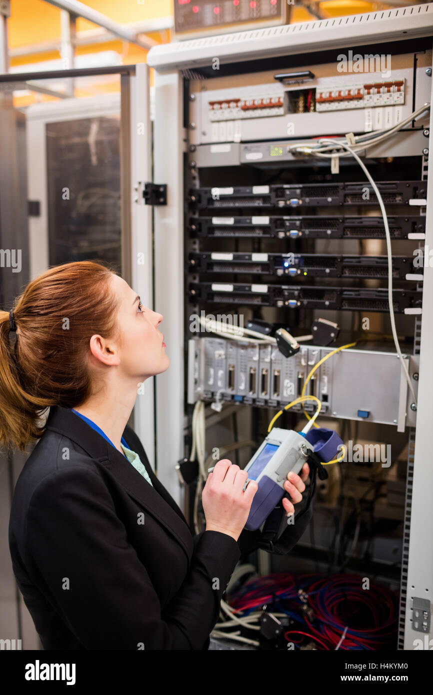 Technician using digital cable analyzer Stock Photo - Alamy