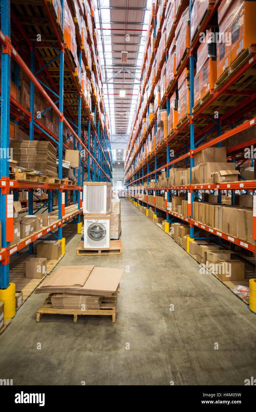 Boxes kept on shelves in the warehouse Stock Photo - Alamy