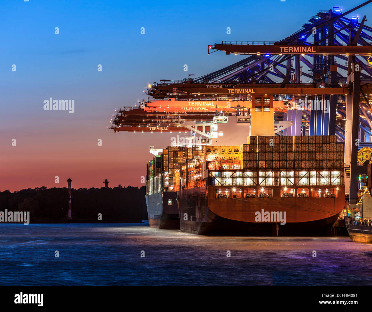 Big Container Ship at Hamburg Container Port in the Light of the ...