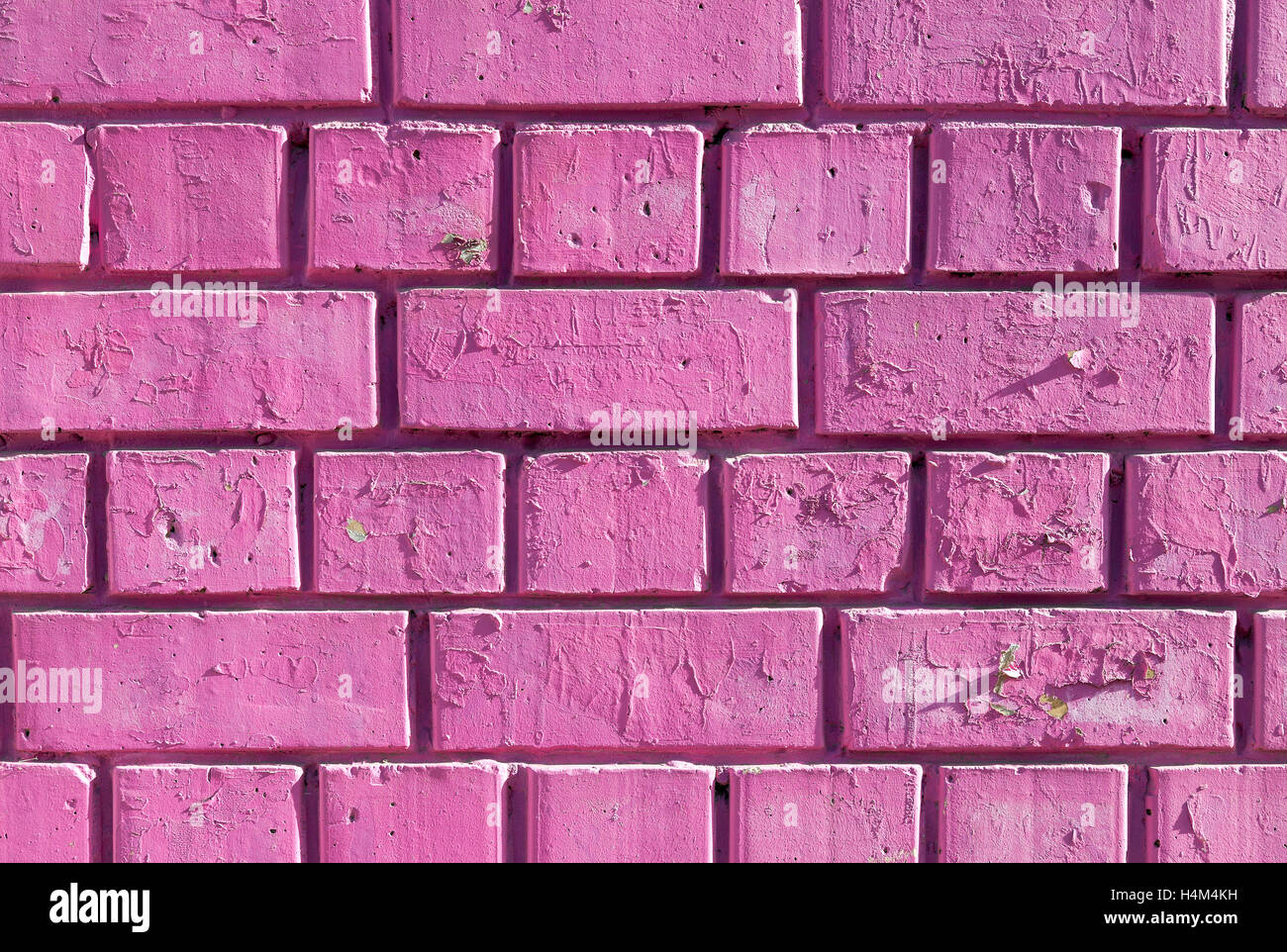 Old weathered pink brick wall as a creative background Stock Photo - Alamy