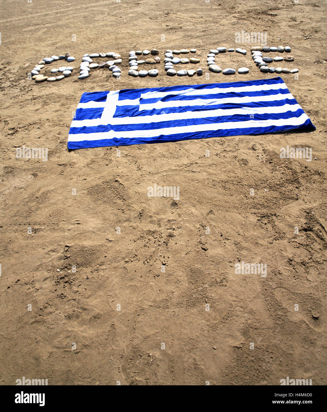 Greece written in pebbles at Agnos Beach, Corfu Greece, next to Greek ...
