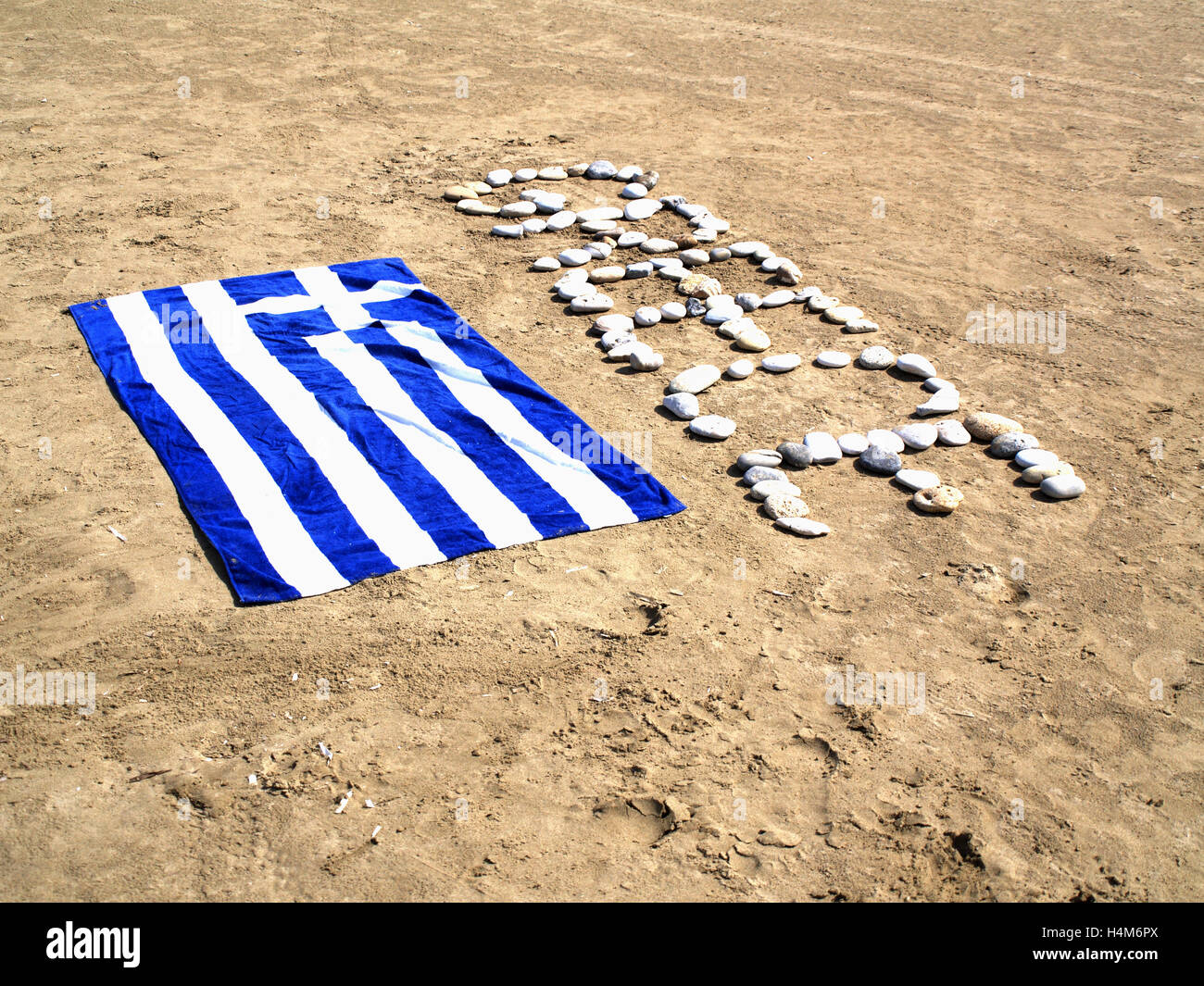 Greece written in pebbles at Agnos Beach, Corfu Greece, next to Greek ...