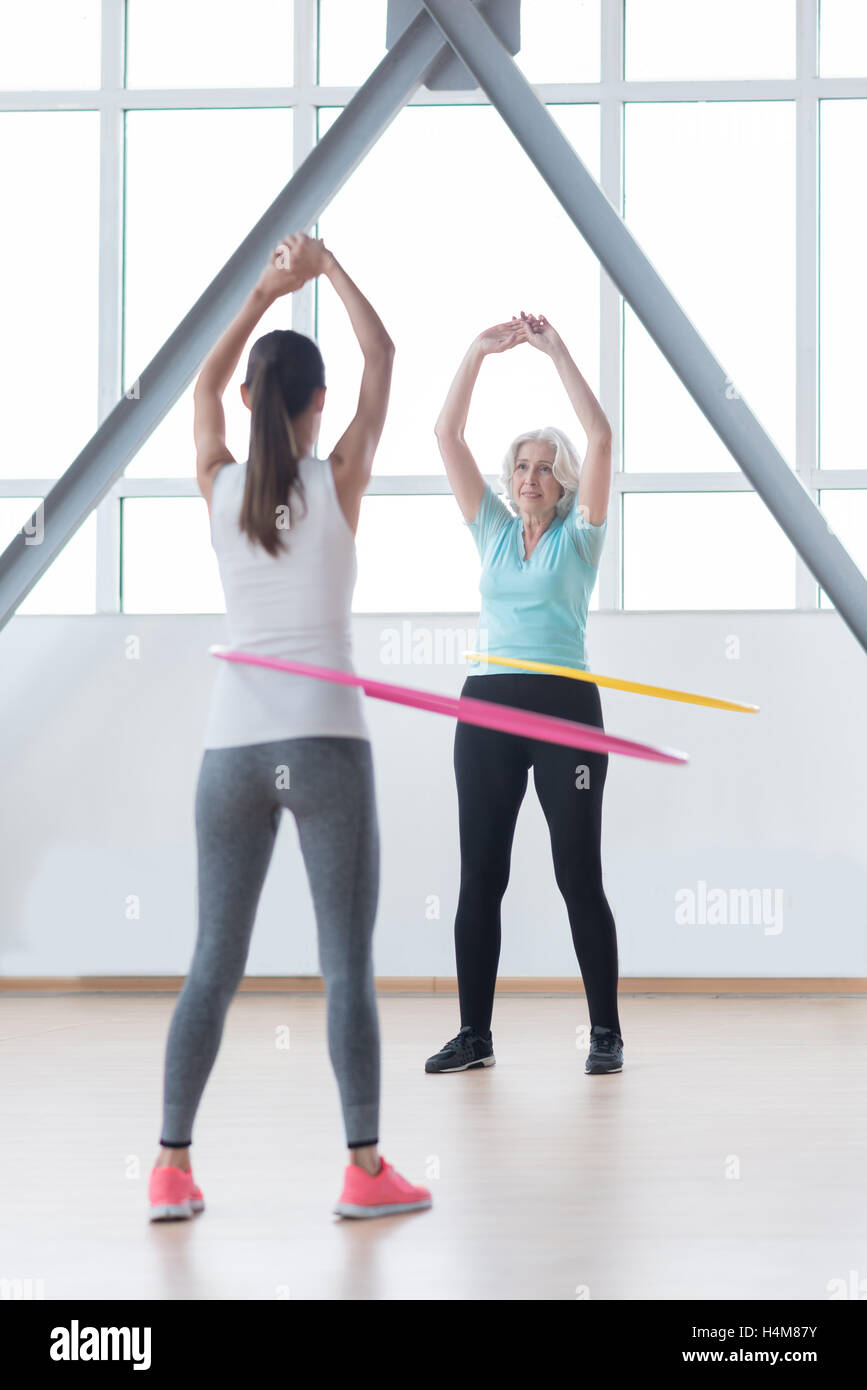 People using hula hoops hi-res stock photography and images - Alamy