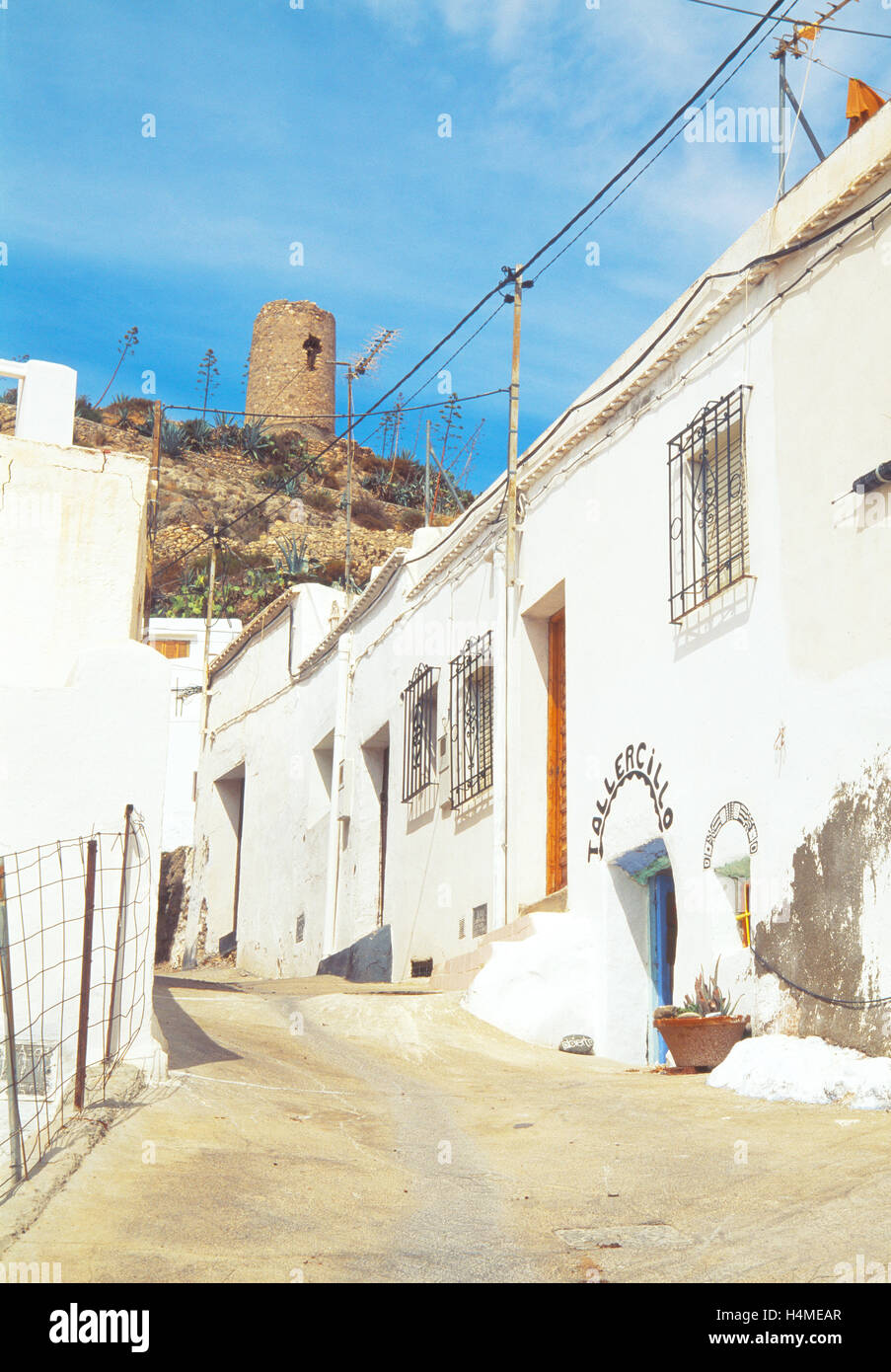 Street and castle. Nijar, Almeria province, Andalucia, Spain Stock ...