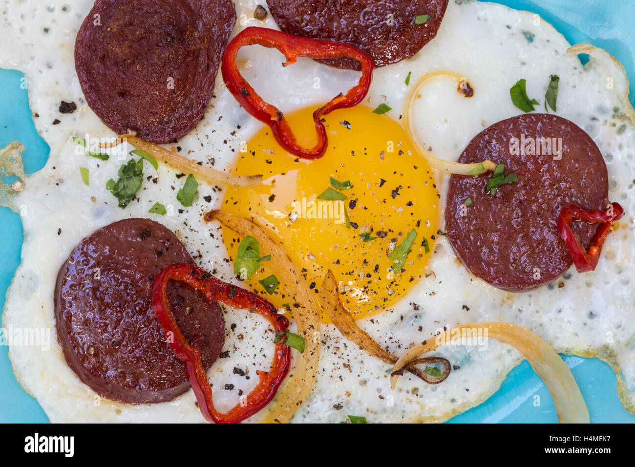 Sucuk turkish garlic sausage with egg Stock Photo - Alamy