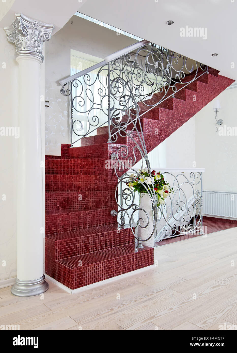 Classical mosaic stairs with ornamental iron handrail design Stock ...