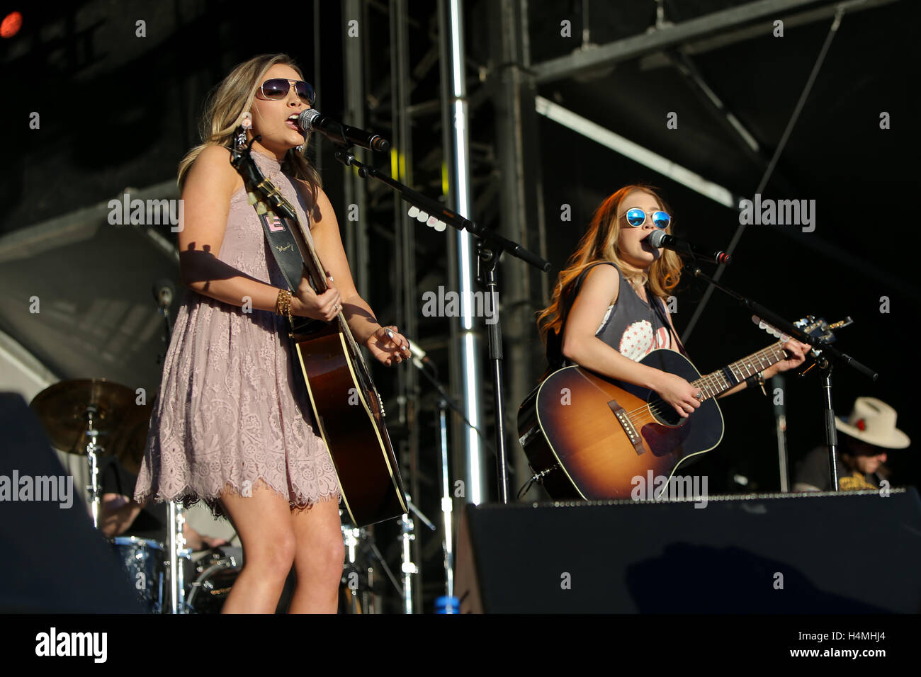 Singer Taylor Dye (L) and Madison Marlow of Maddie and Tae perform ...