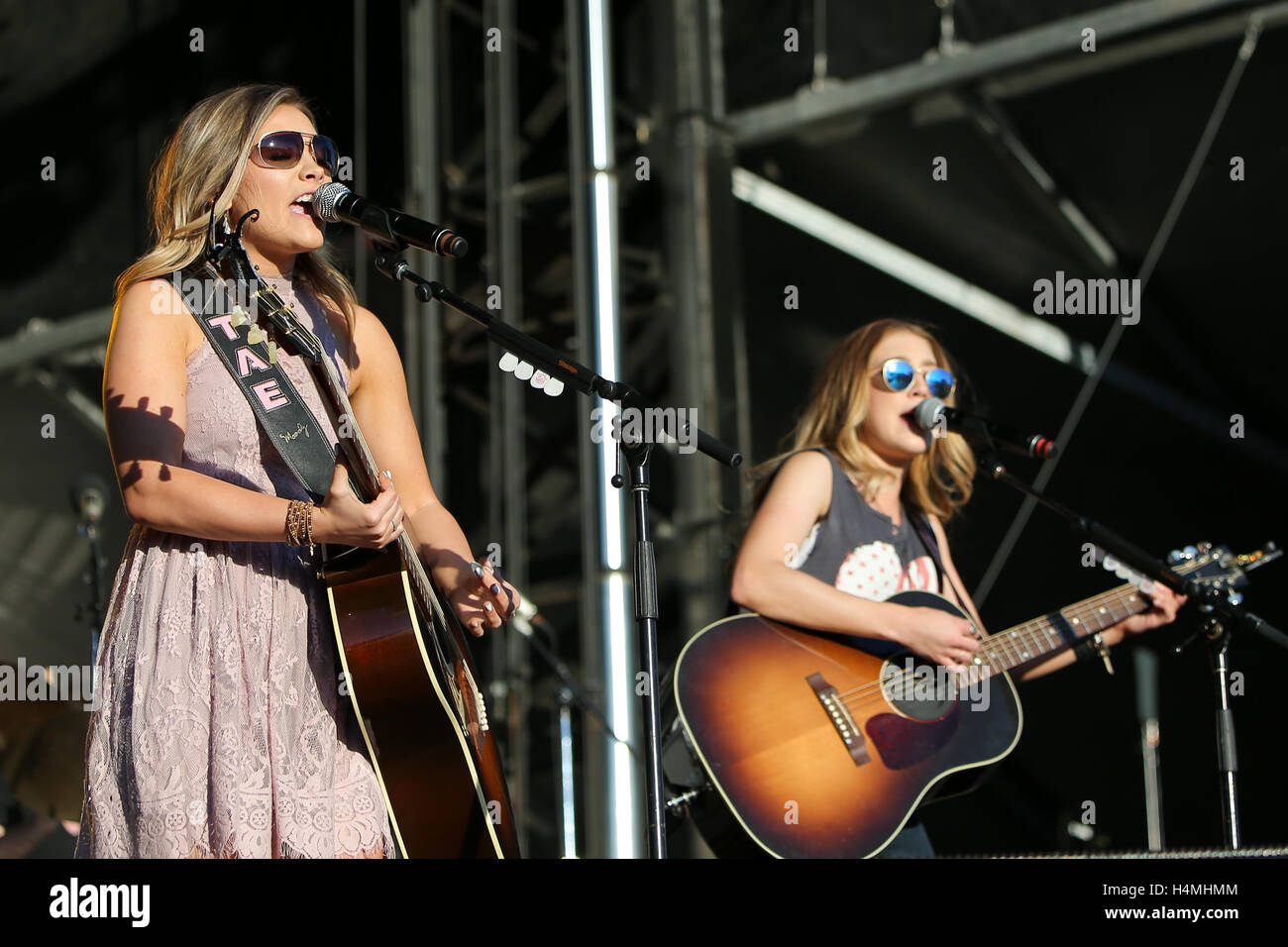 Singer Taylor Dye (L) and Madison Marlow of Maddie and Tae perform ...