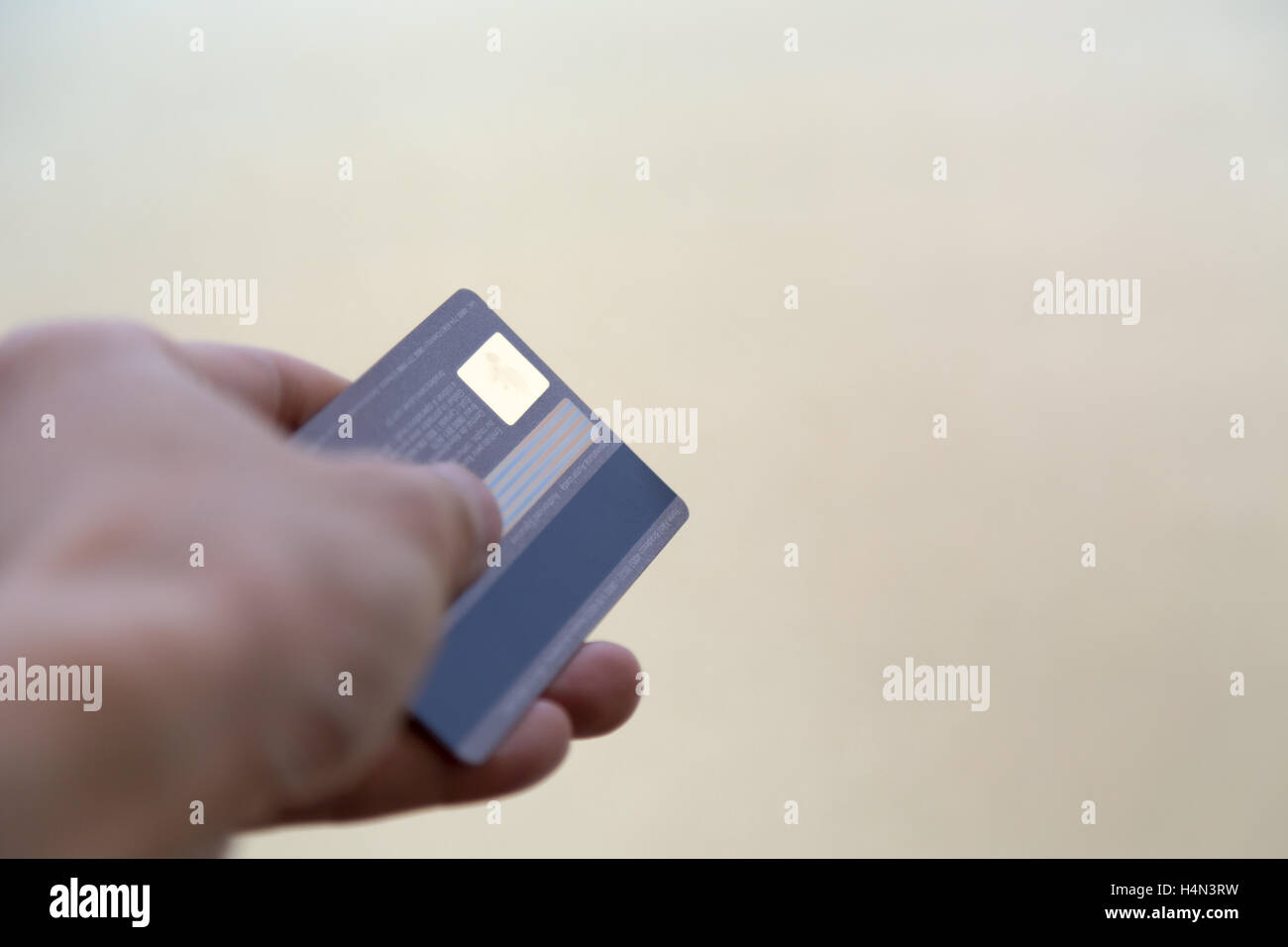 Hand holding a debit, credit card Stock Photo - Alamy