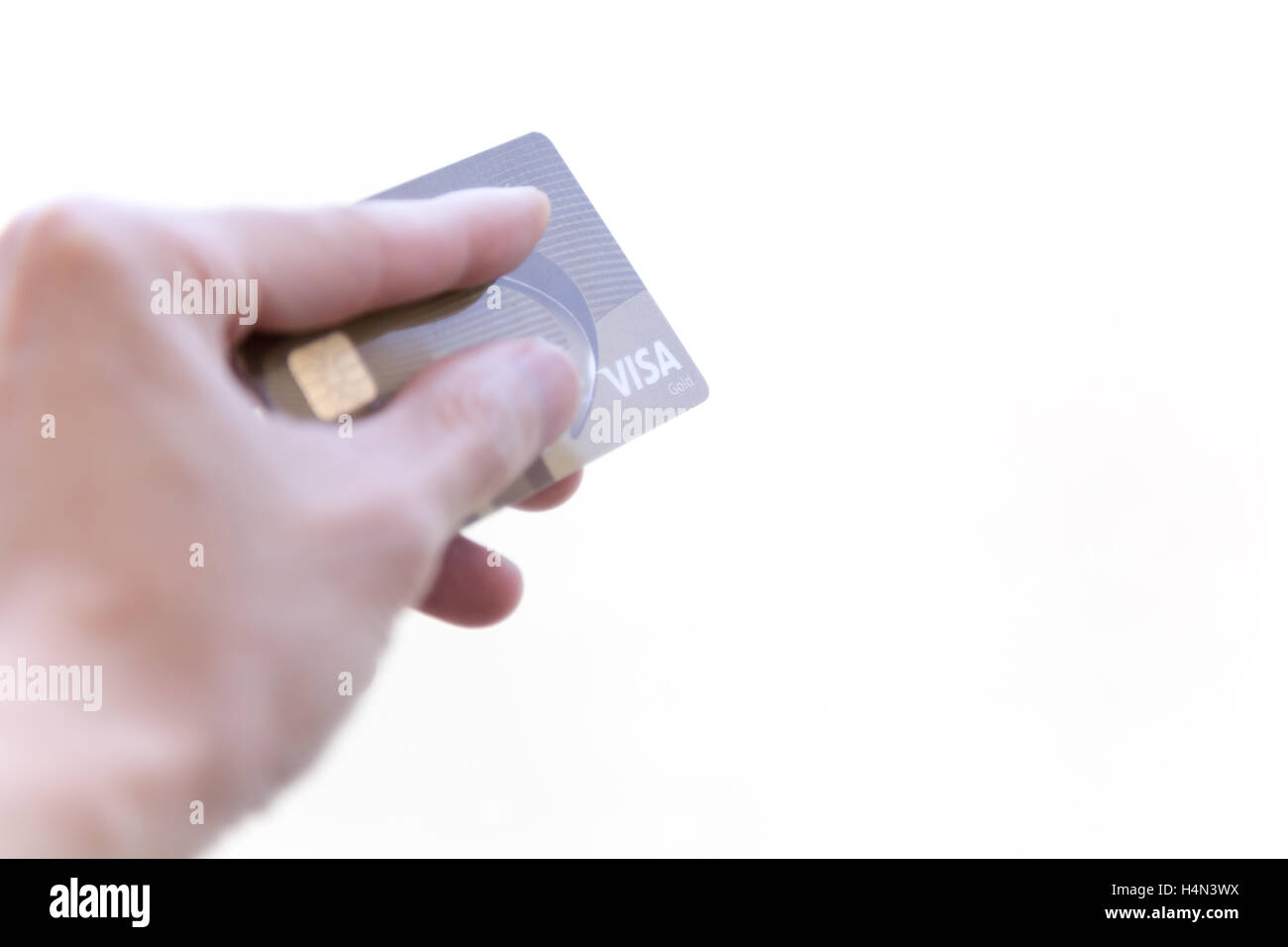 Hand holding a debit, credit card Stock Photo - Alamy