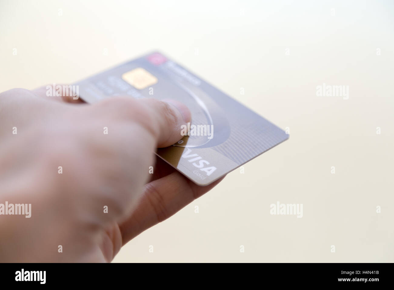 Hand holding a debit, credit card Stock Photo - Alamy