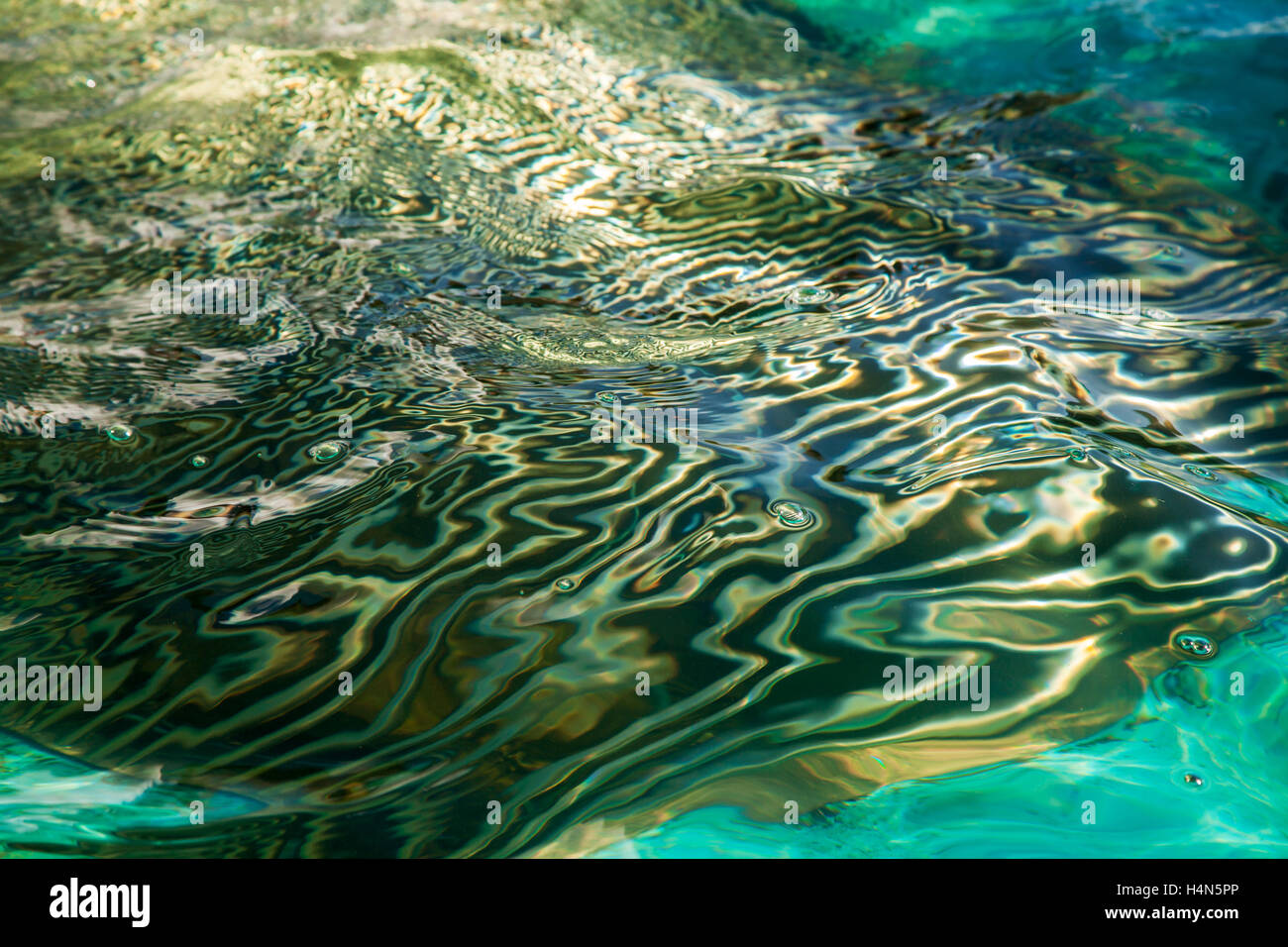 Bright rainbow reflection liquid in hi-res stock photography and images ...