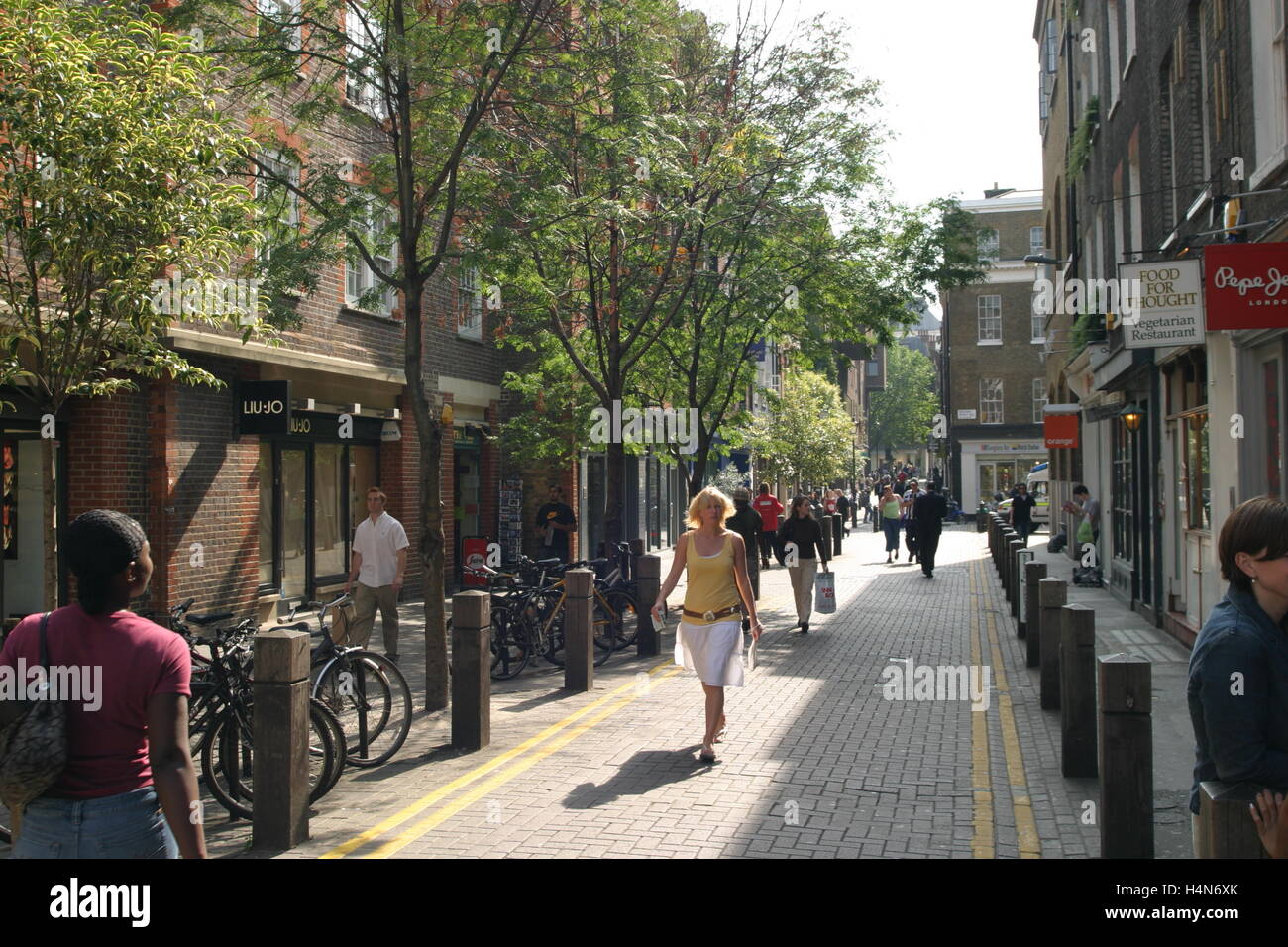 A woman walks down Neal Street in London's Covent Garden, famous for it ...