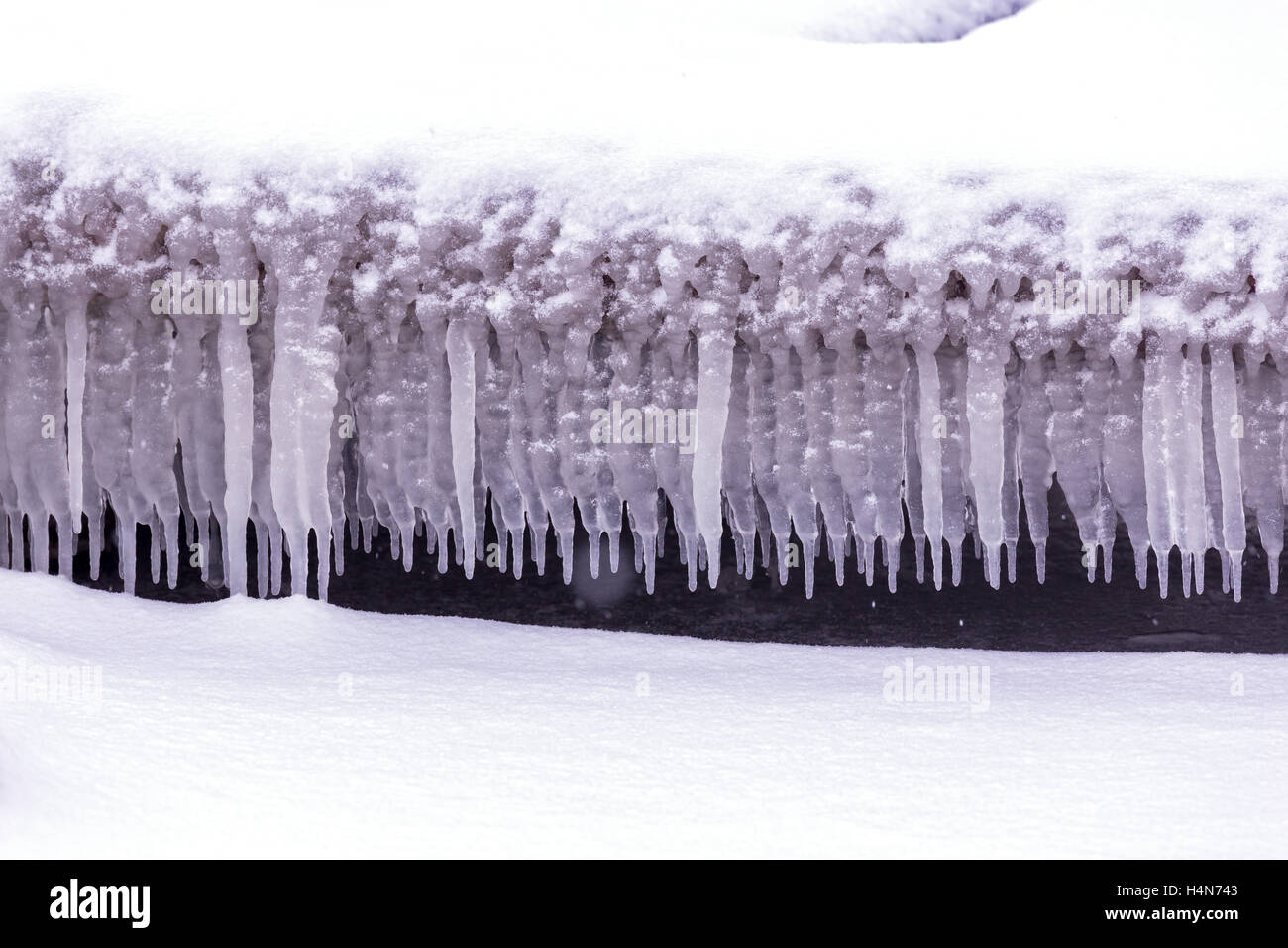 Cold winter day with many icicle Stock Photo - Alamy