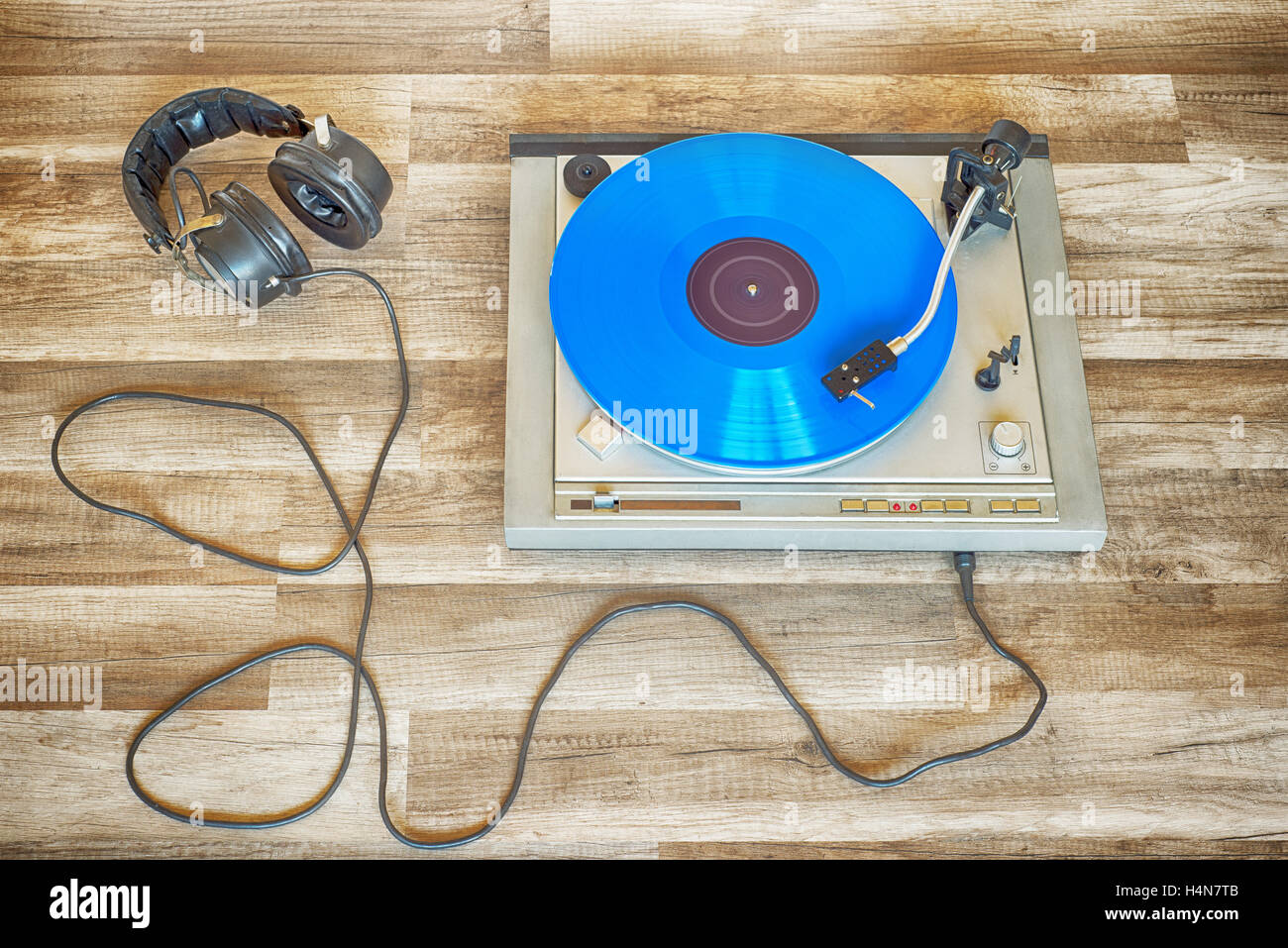 blue vinyl record spinning on the turntable Stock Photo - Alamy