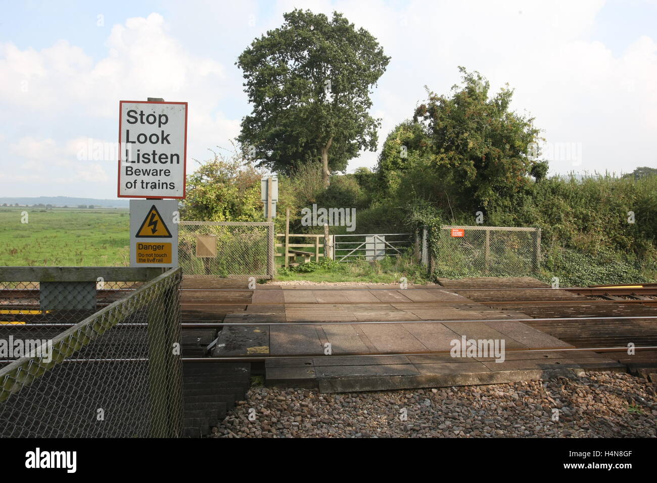 Footpath crosses railway line, Amberley, West Sussex, England Stock ...