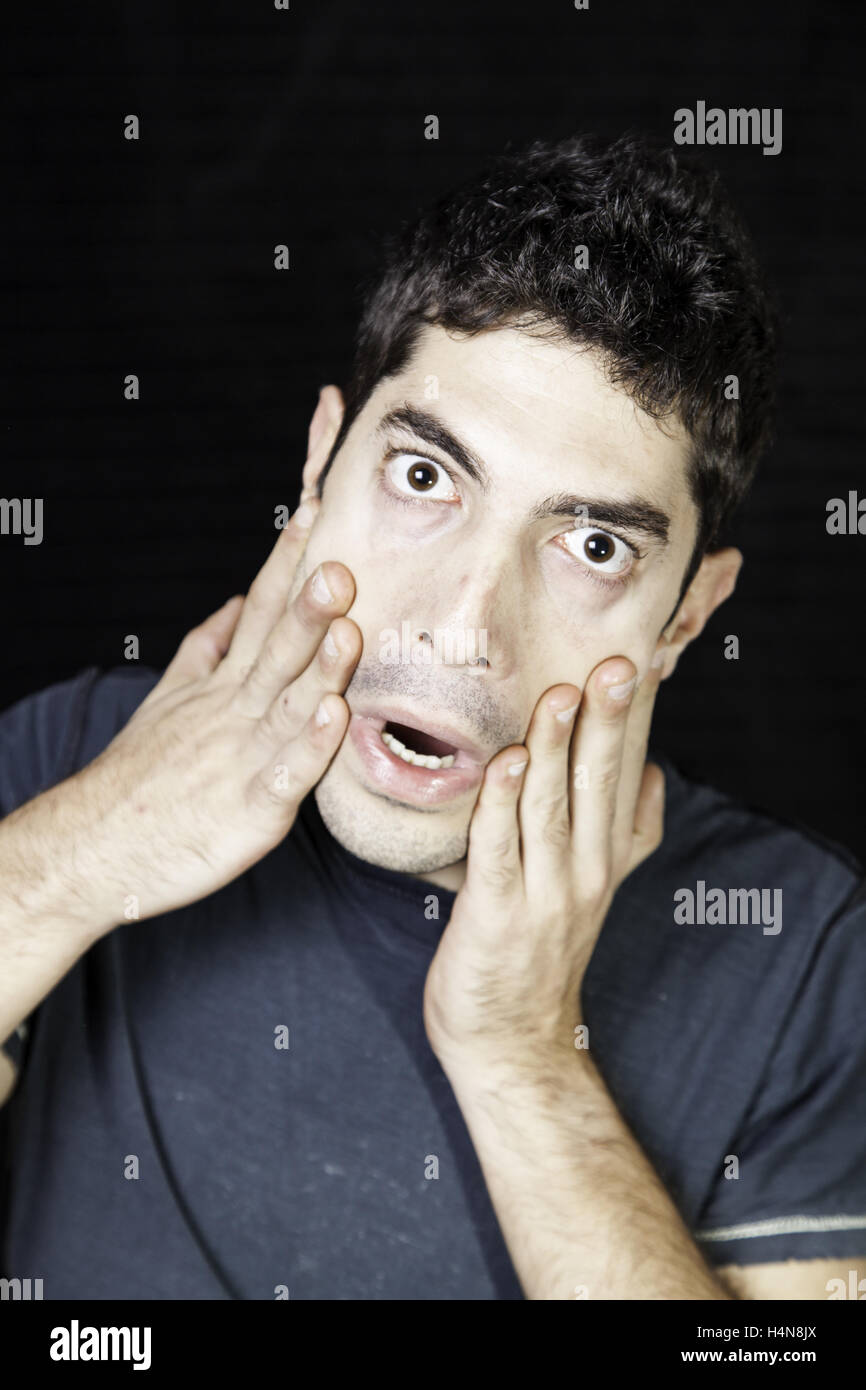 Frightened man screaming, scared and surprised young Stock Photo - Alamy