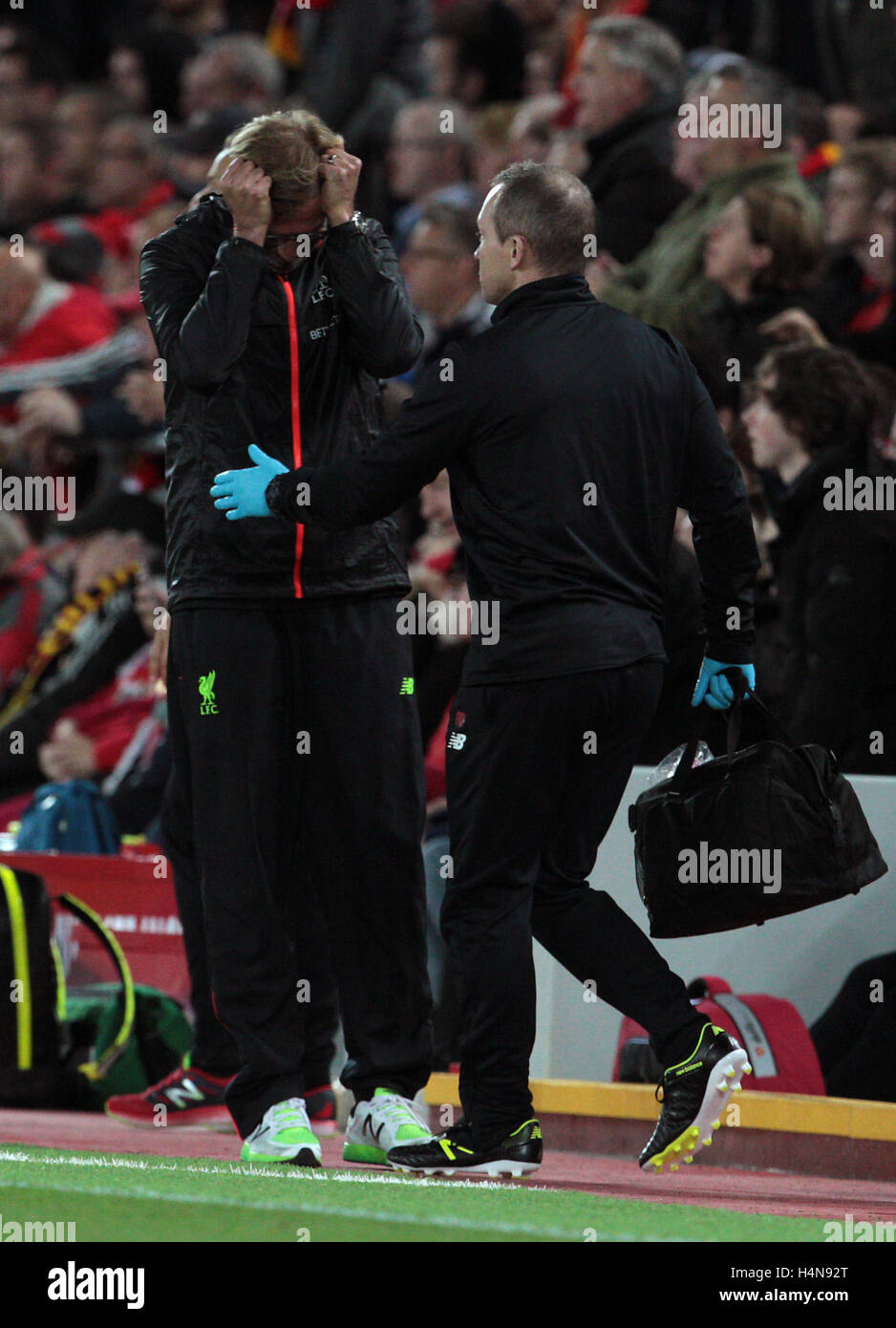 Liverpool manager Jurgen Klopp (left) shows his frustration during the ...