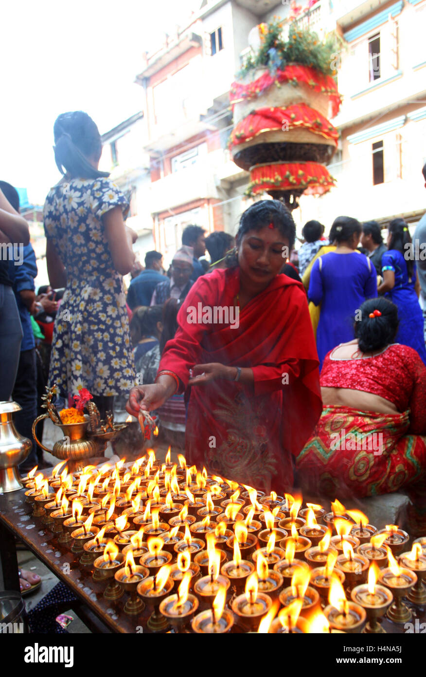 Kathmandu, Nepal. 17th Oct, 2016. A devotee offers prayers during ...