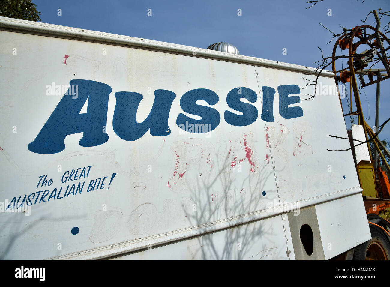 " Aussie, the great Australian bite " sign on side of mine camp at ...