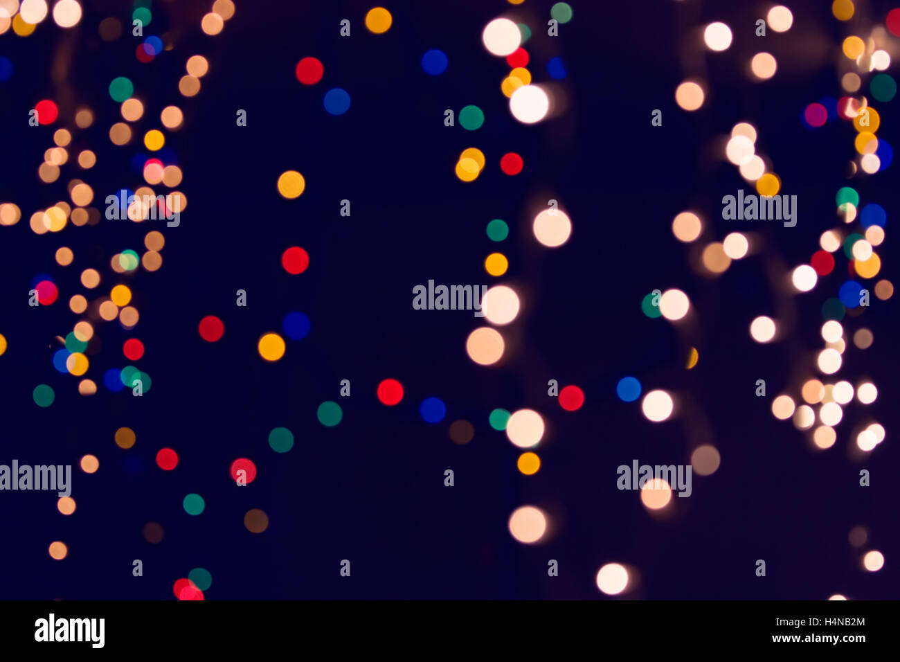 Holiday background with blurred sparkling multi-coloured lights Stock ...