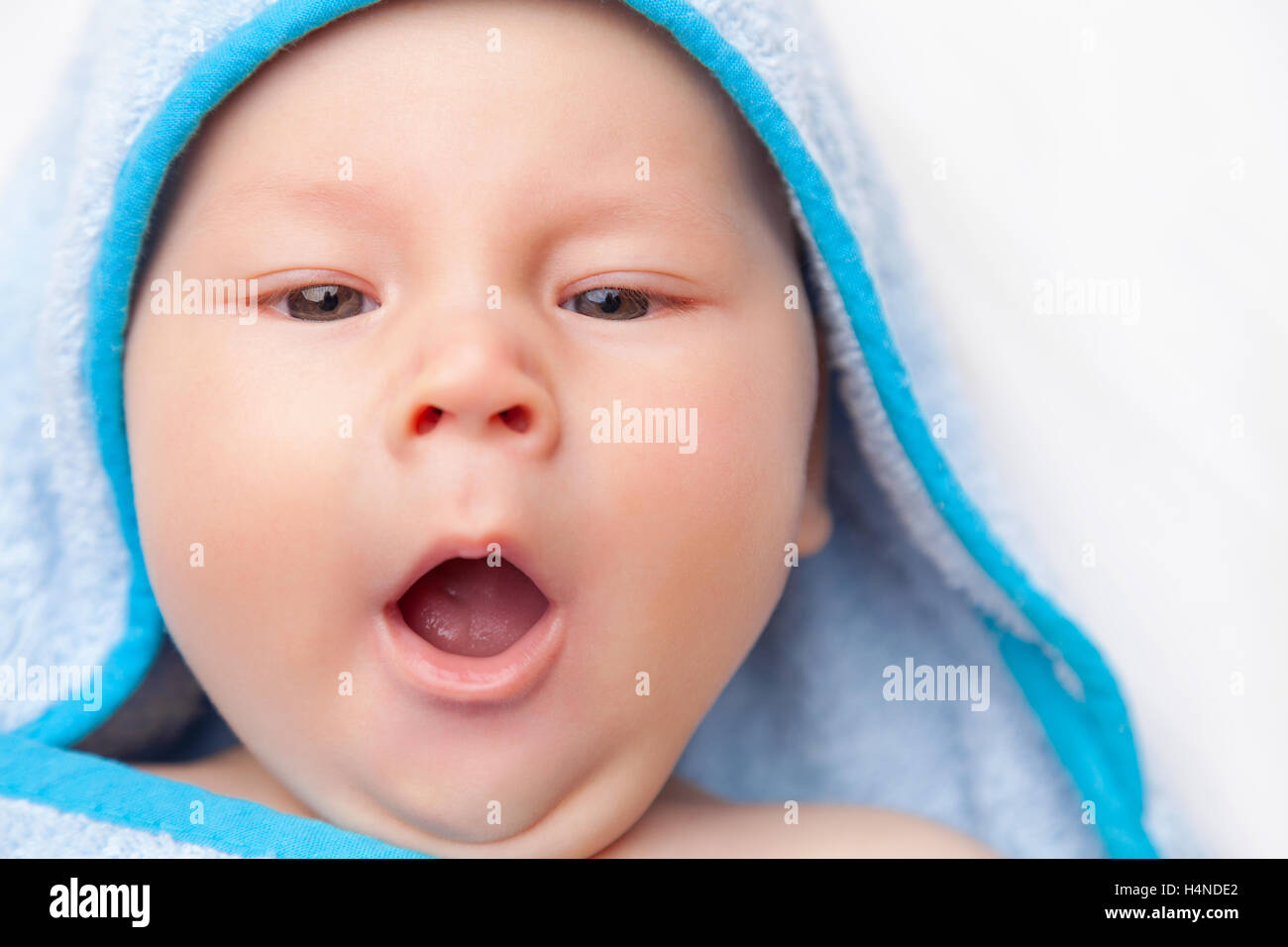 Beautiful newborn baby wrapped in a blanket Stock Photo - Alamy