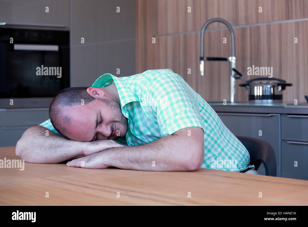 Fat man sitting hi-res stock photography and images - Alamy