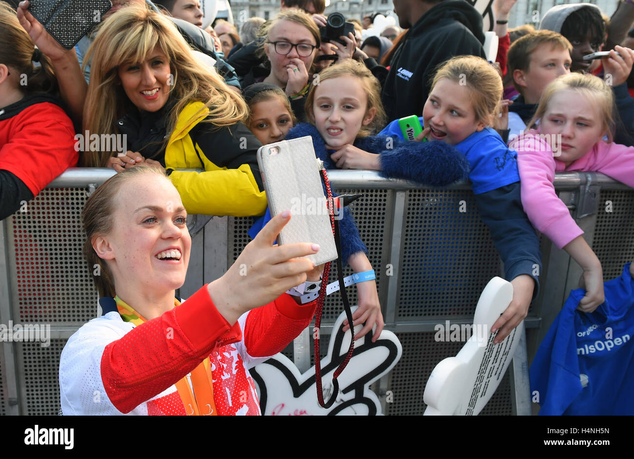 Eleanor Simmonds takes a picture with members of the crowd during the ...