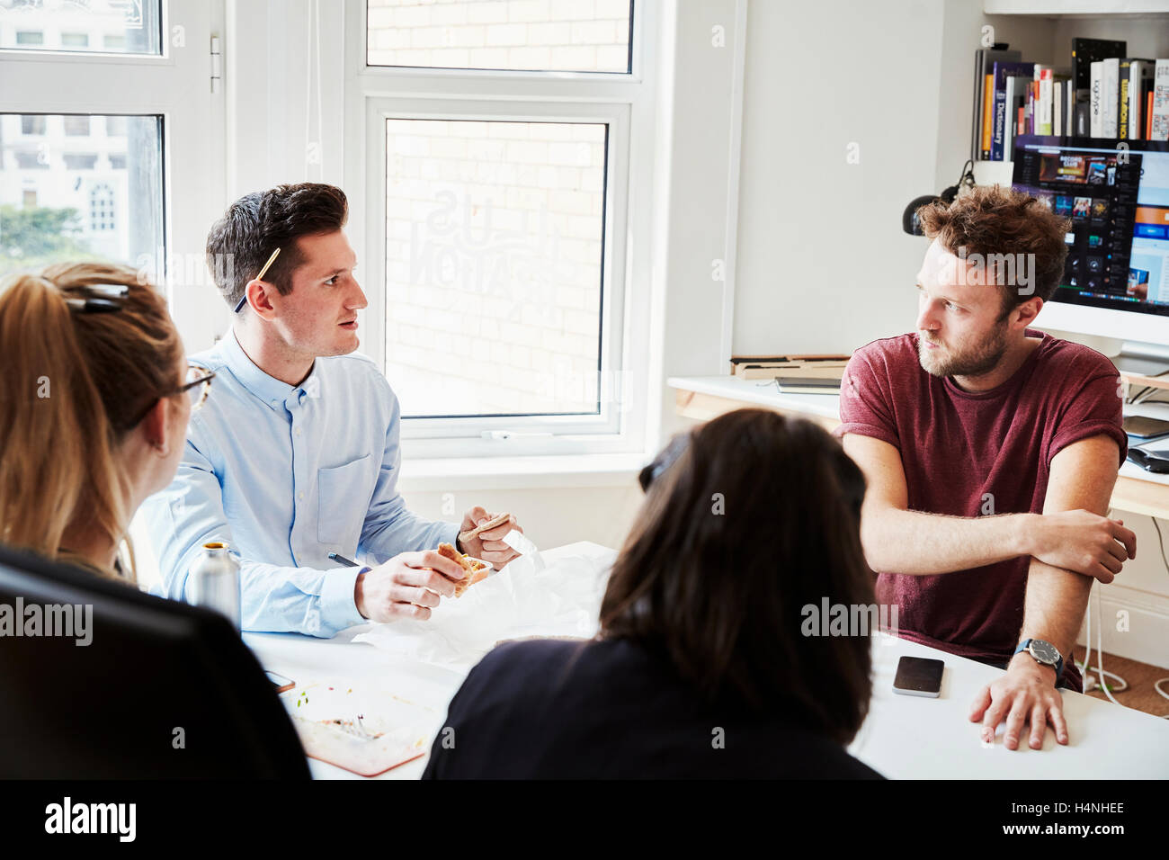 Business people meeting around table hi-res stock photography and ...