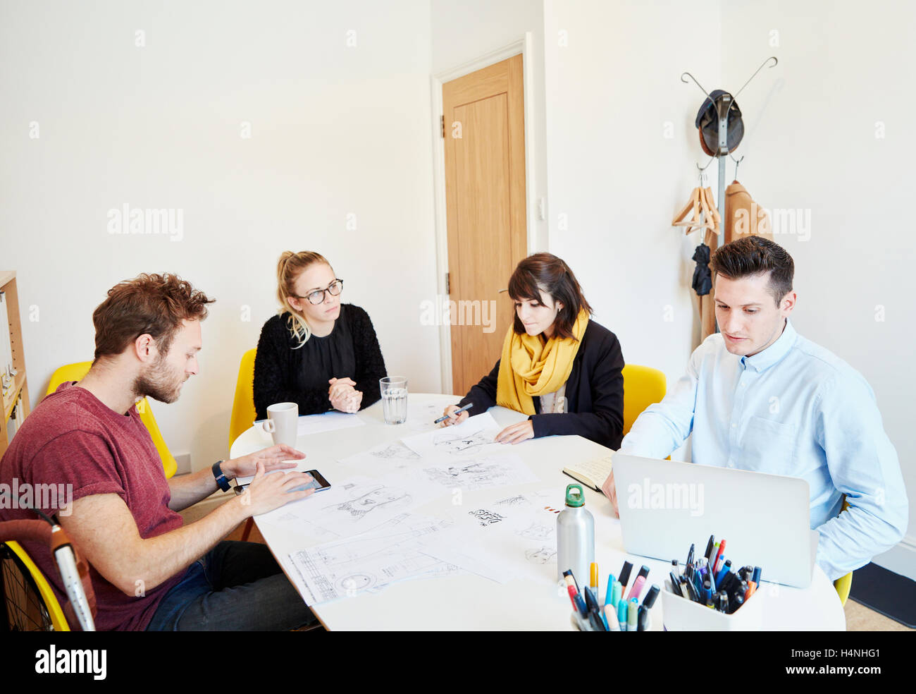 People working around a computer hi-res stock photography and images ...