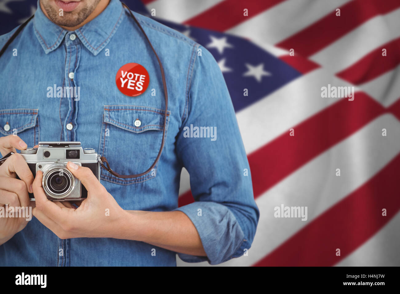 Composite image of mid section of man adjusting camera lens Stock Photo ...