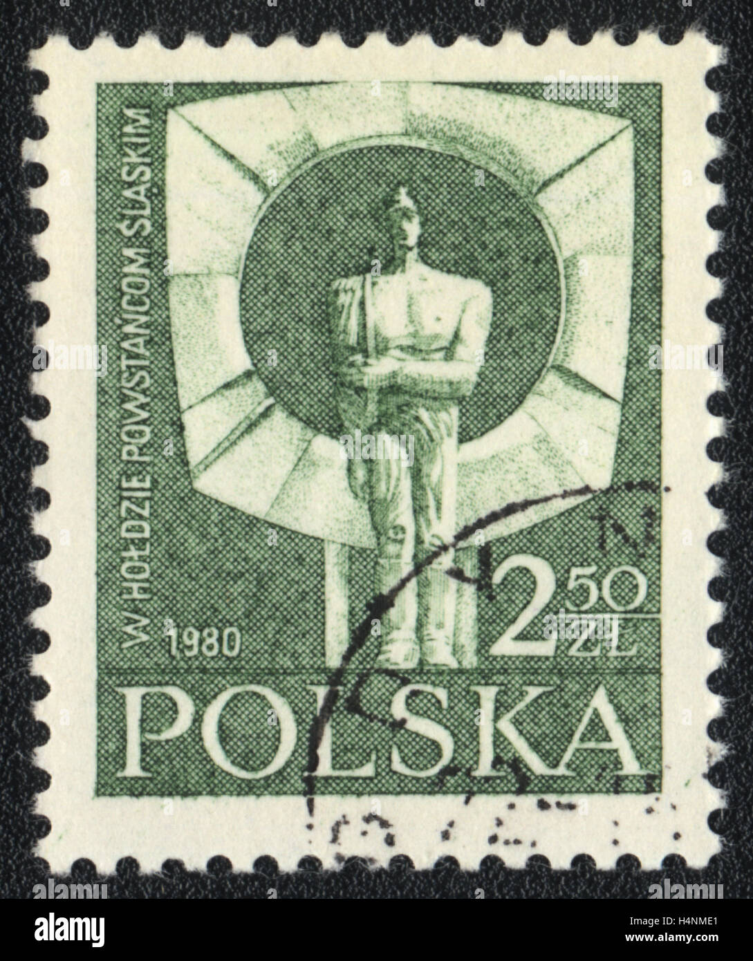 A postage stamp printed in Poland, shows Monument in tribute to the ...