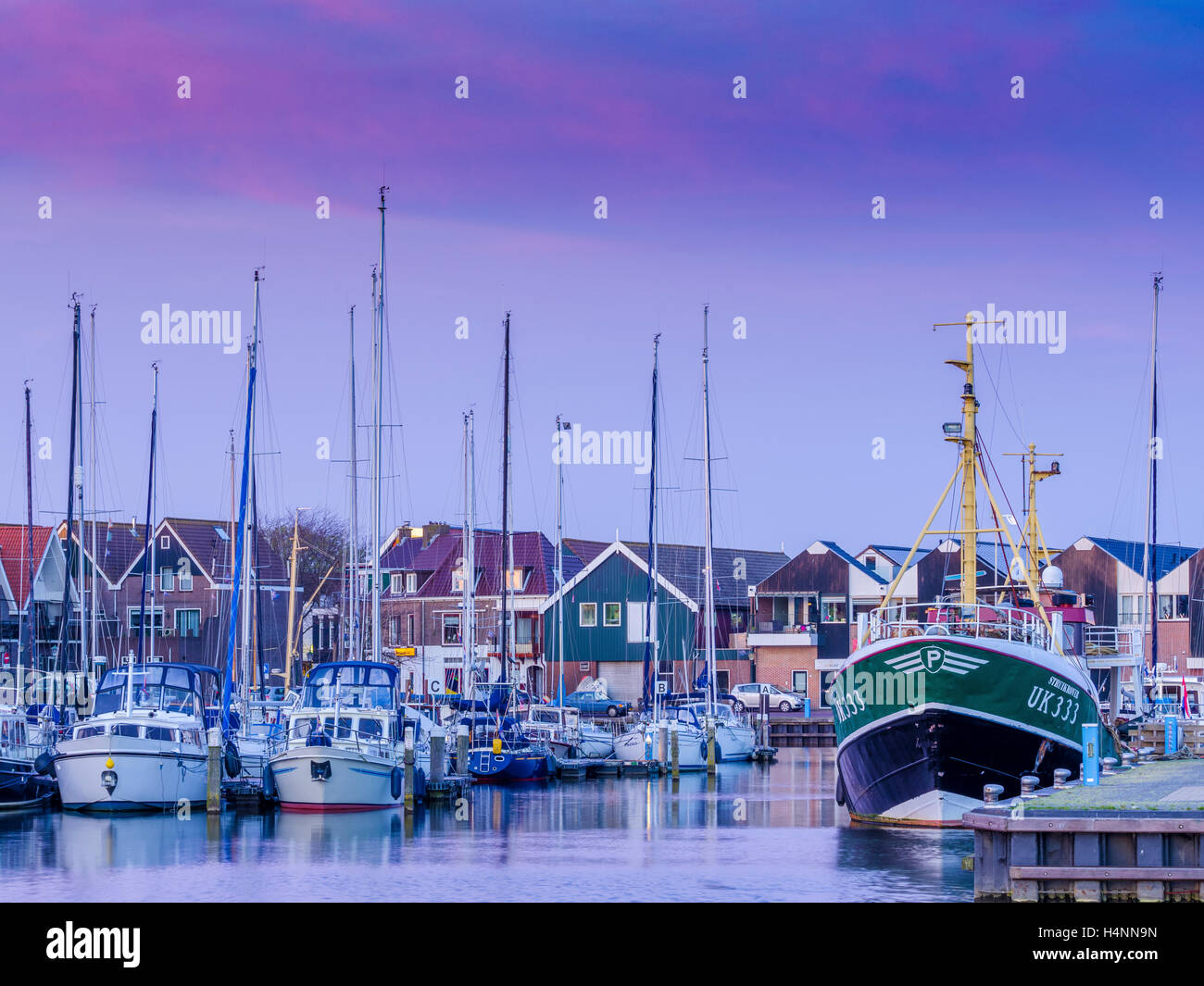 Fishing harbor at dusk, Netherlands Stock Photo - Alamy