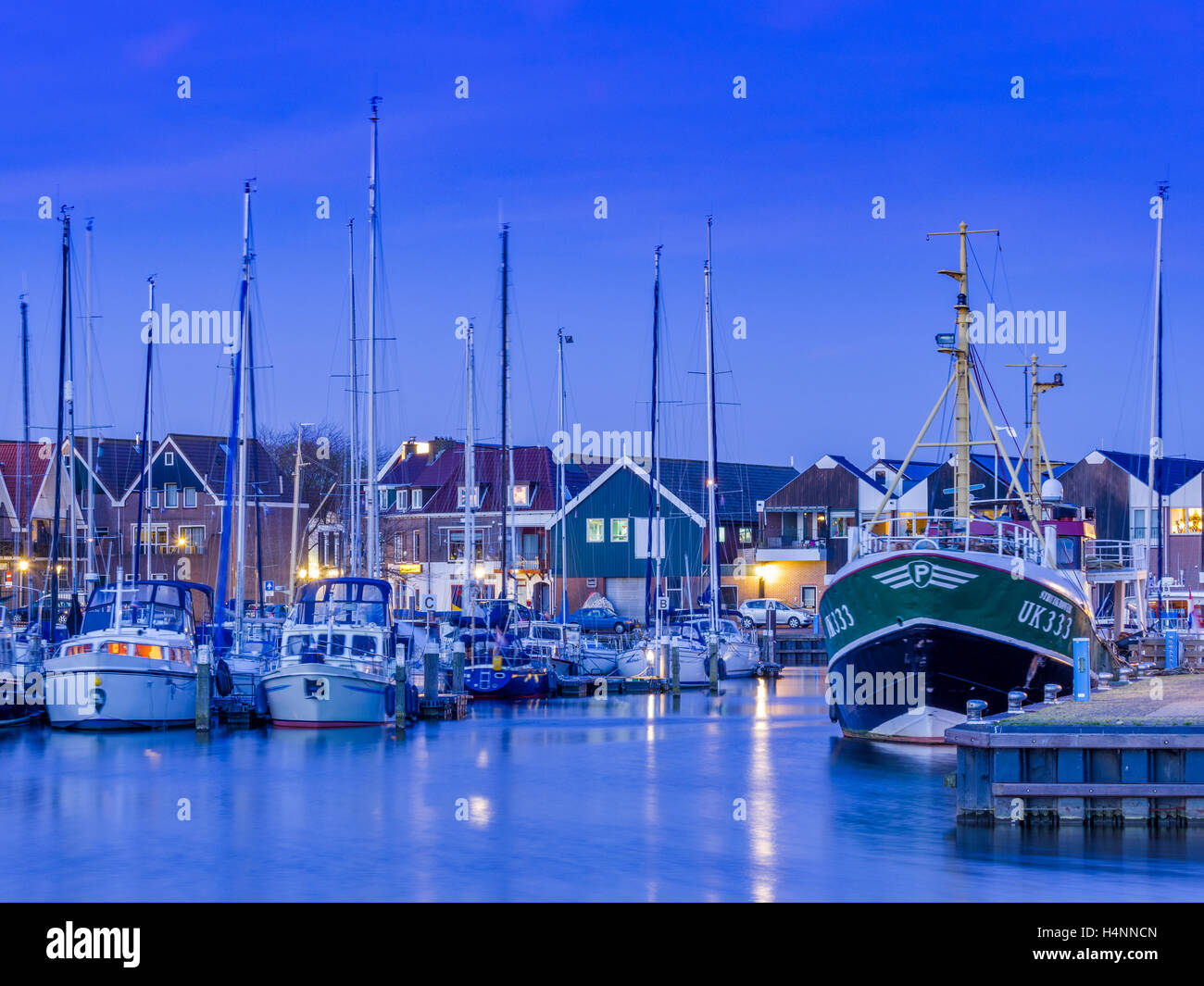 Fishing harbor at dusk, Netherlands Stock Photo - Alamy