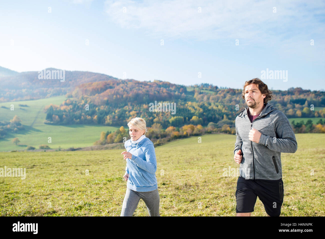 Beautiful young couple running hi-res stock photography and images - Alamy