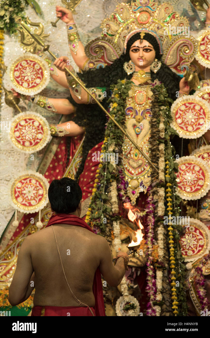 The image of Pandit praying in front of goddess Durga, Mumbai ...