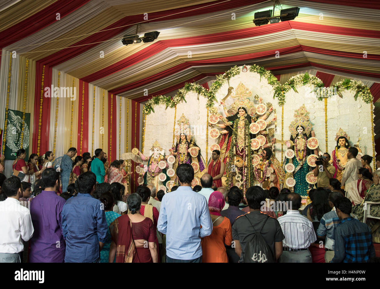 The image of Pandit praying in front of goddess Durga, Mumbai ...