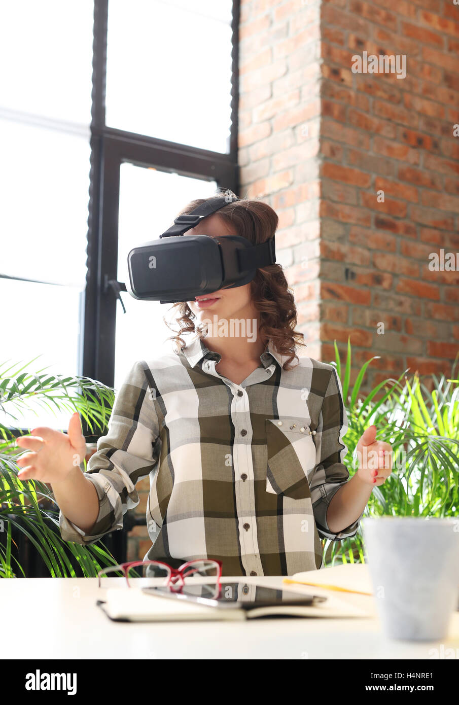 Woman with VR headset Stock Photo - Alamy