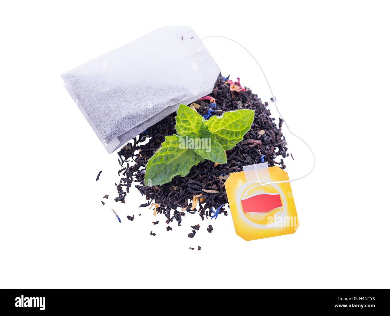 Leaf tea and tea a packet on a white background Stock Photo - Alamy