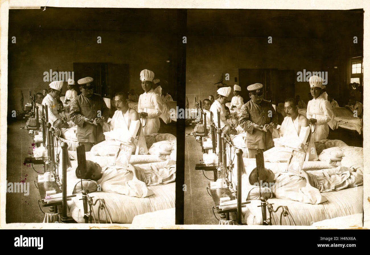 Doctor attending wounded soldiers hi-res stock photography and images ...