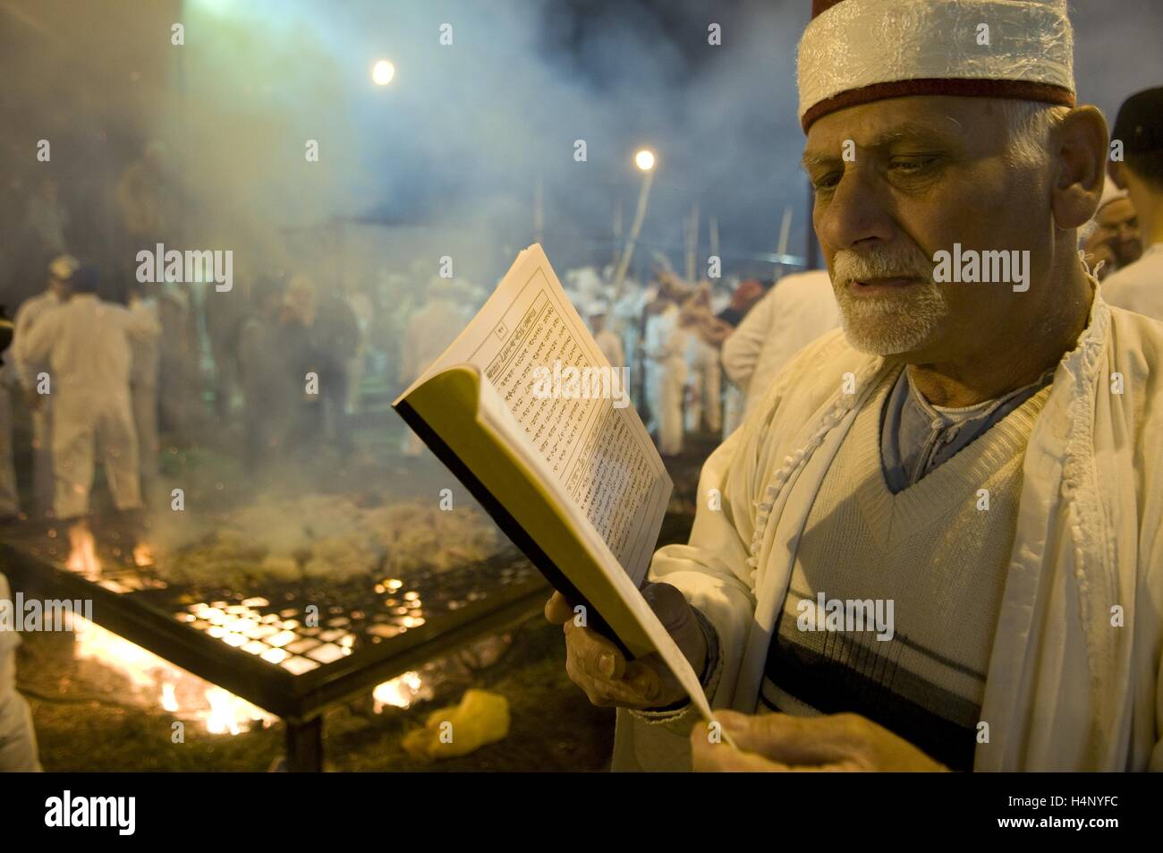 A member of the ancient Samaritan community reading a prayer book ...