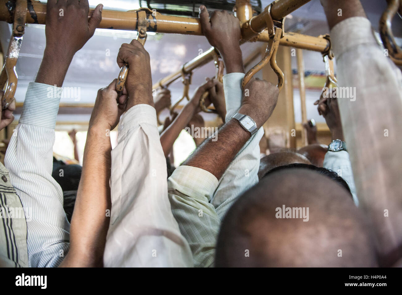 India,Indian,Asian,train,rail,railway,carriage,Strap hanging commuters ...