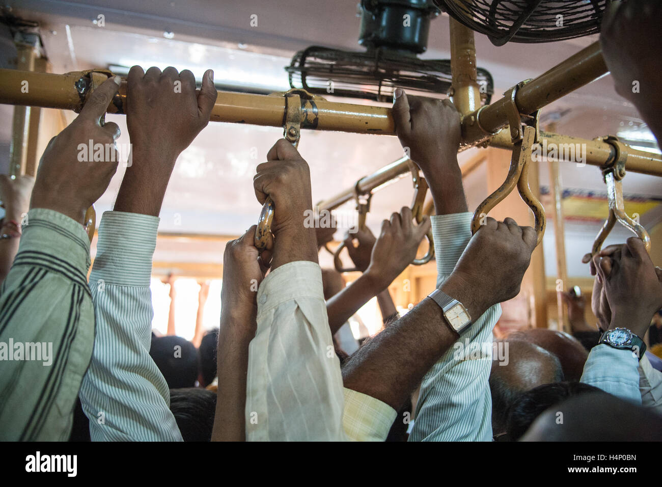 India,Indian,Asian,train,rail,railway,carriage,Strap hanging commuters ...