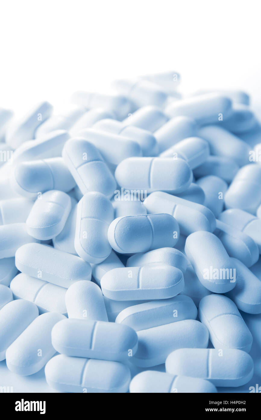 Pile of tablets closeup Stock Photo - Alamy