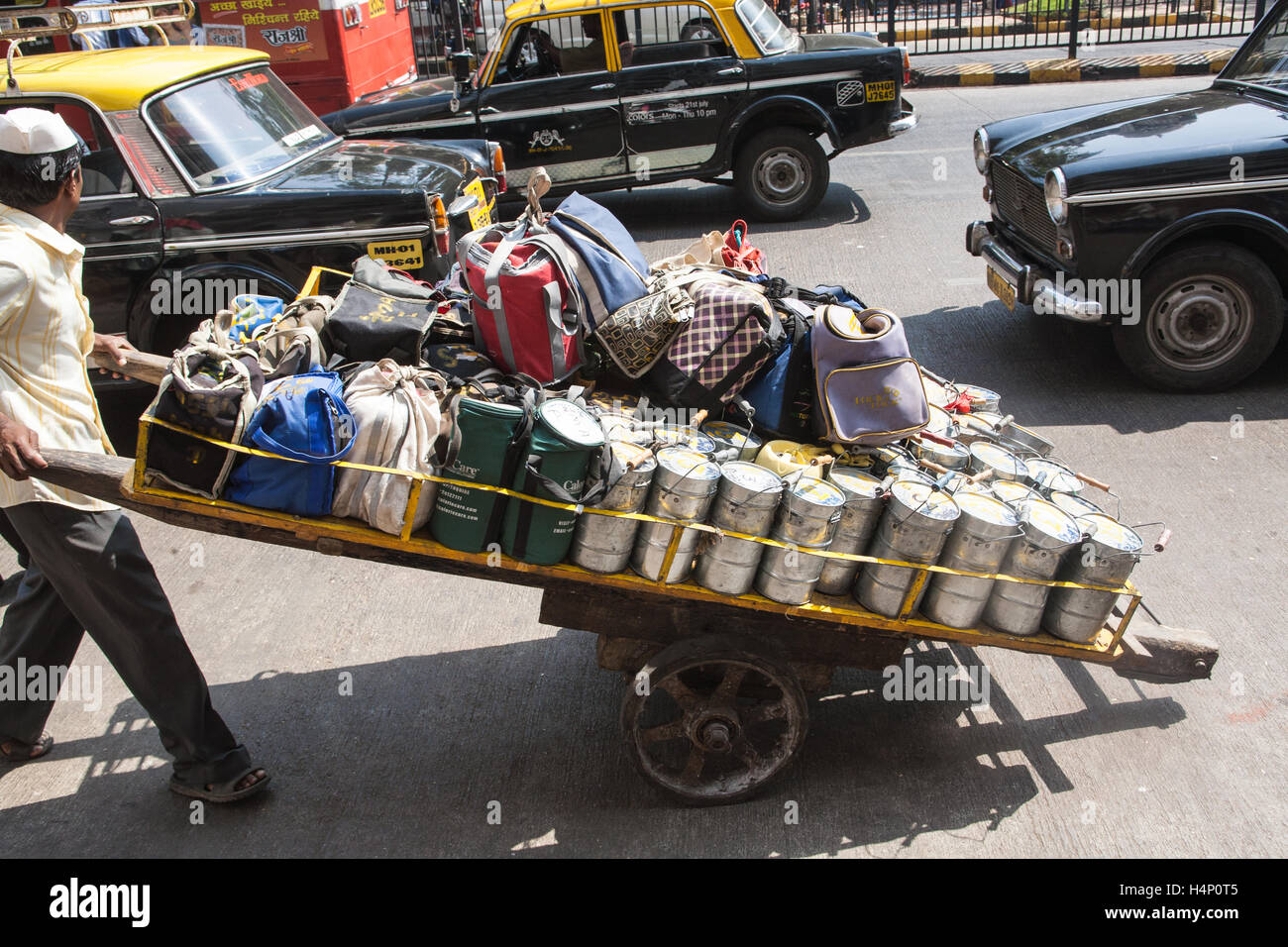 Dabbawala carrying lunch tiffin boxes hi-res stock photography and ...