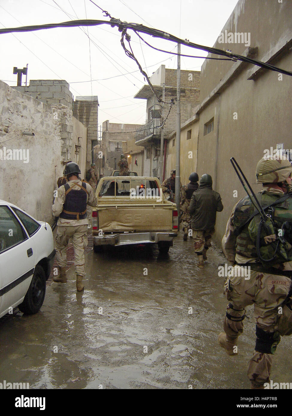 22nd November 2004 U.S. Army and Iraqi soldiers on the rain-soaked ...